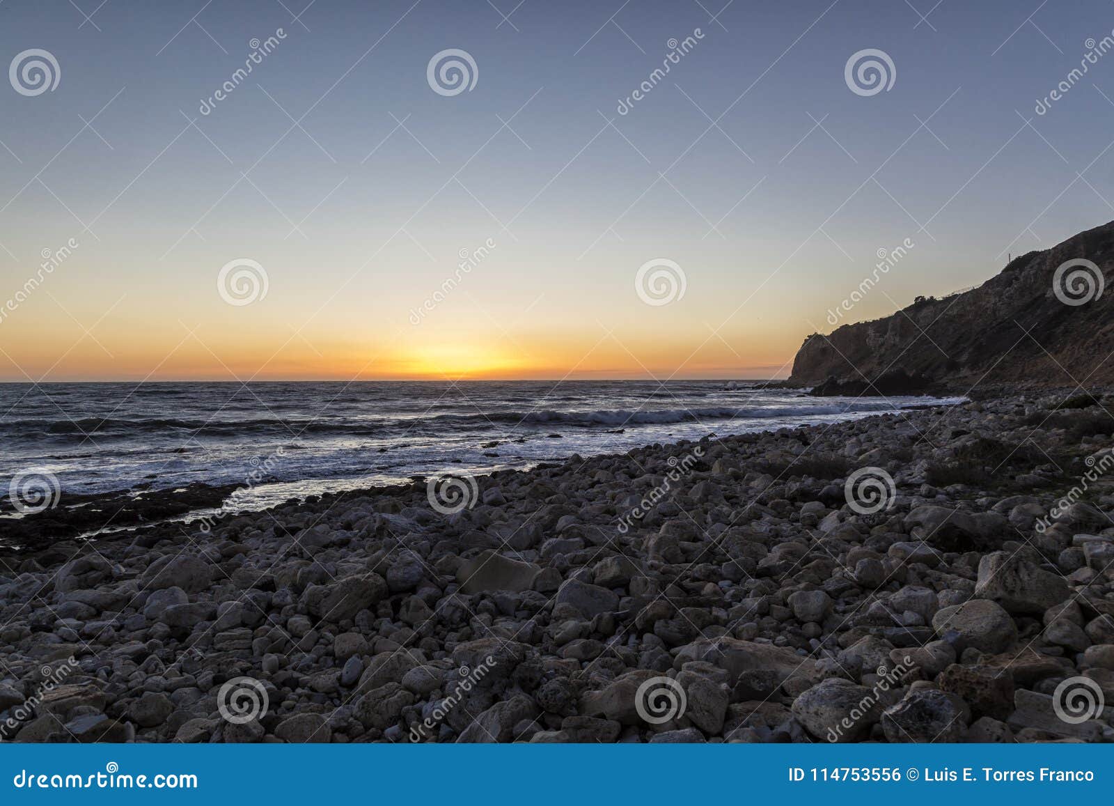 Sunset in the Beach stock photo. Image of cloud, evening - 114753556
