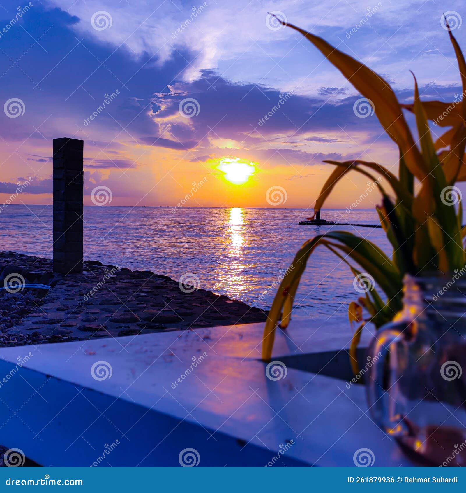 Sunset at beach utama raya stock photo. Image of dusk - 261879936