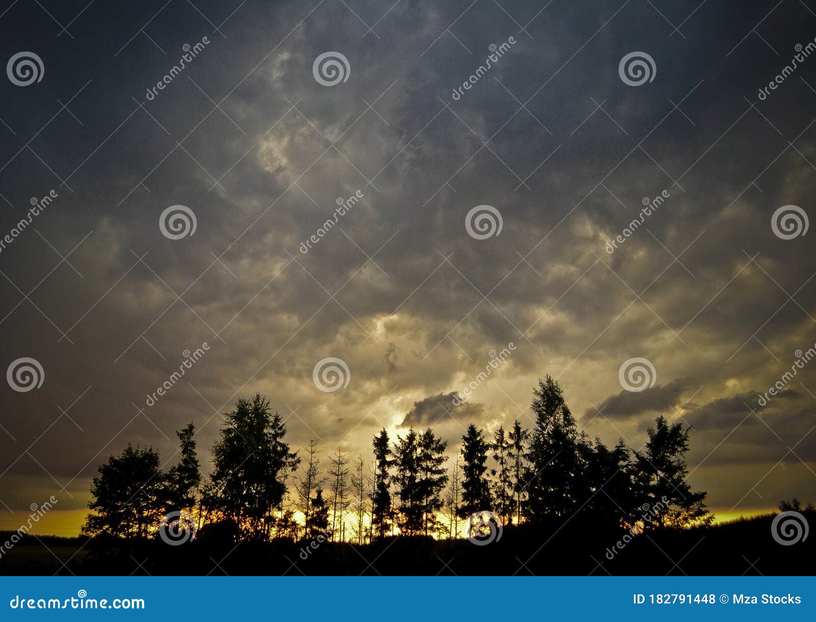 Sunset with Beautiful Cloudy Sky and Treeline Stock Photo - Image of ...