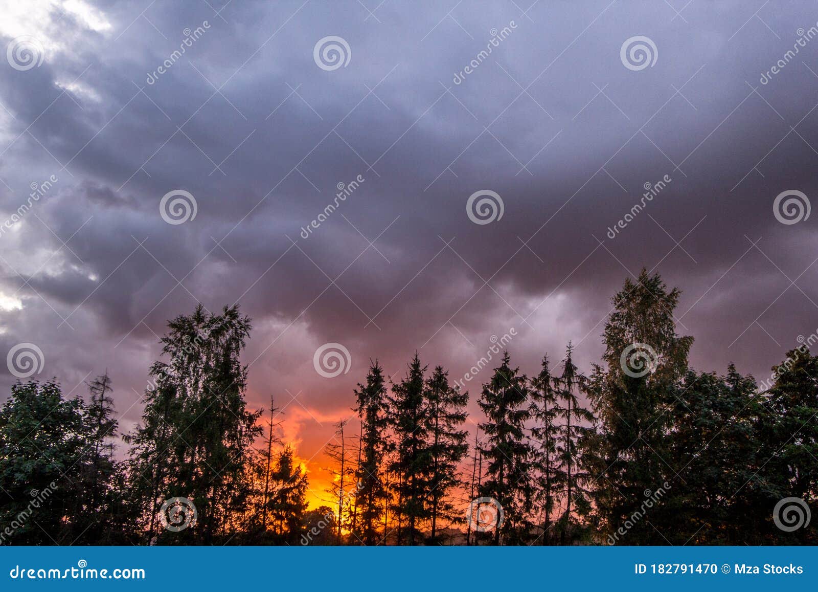 Sunset with Beautiful Cloudy Sky and Treeline Stock Photo - Image of ...