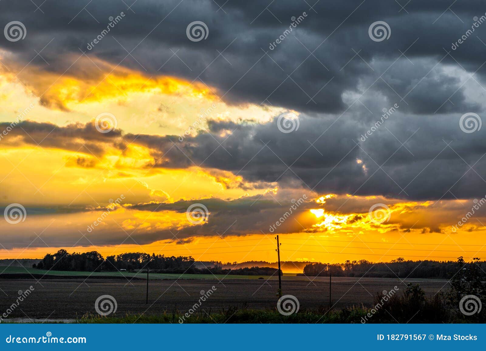 Sunset with Beautiful Cloudy Sky and Treeline Stock Image - Image of ...