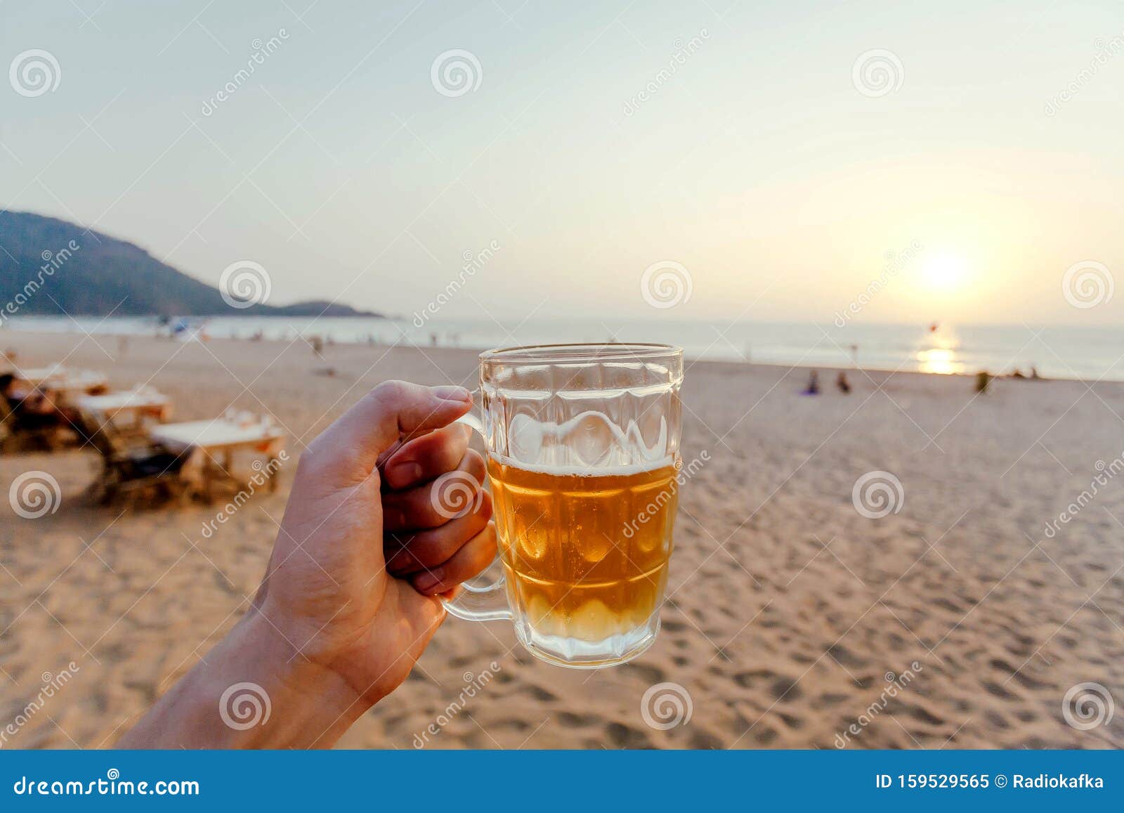Sunset with Beer in a Hand. Vacation on a Calm Sunny Beach Stock Image ...
