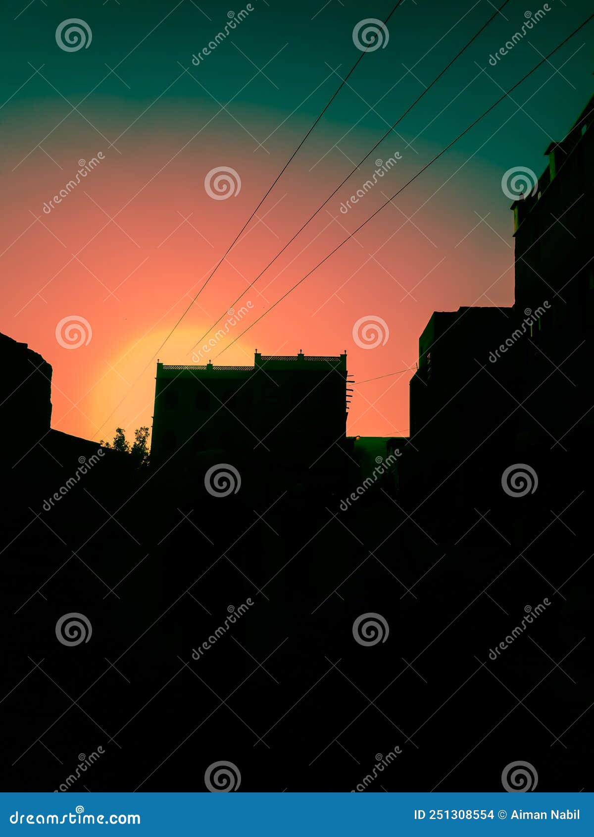 Sunset behind the building stock photo. Image of sunset - 251308554