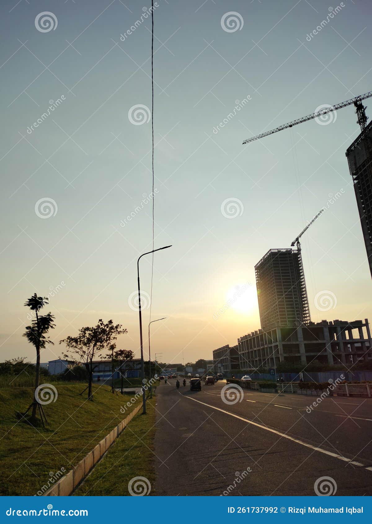 Sunset Behind Building Construction when You through the Road Stock ...