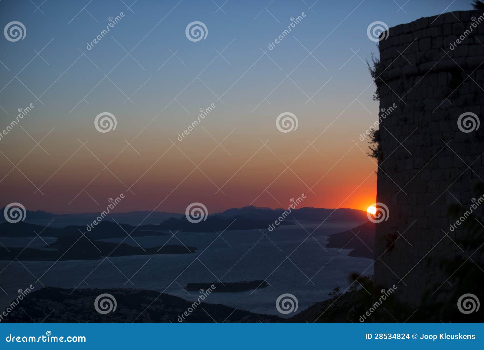 Sunset behind a castle stock photo. Image of tropical - 28534824