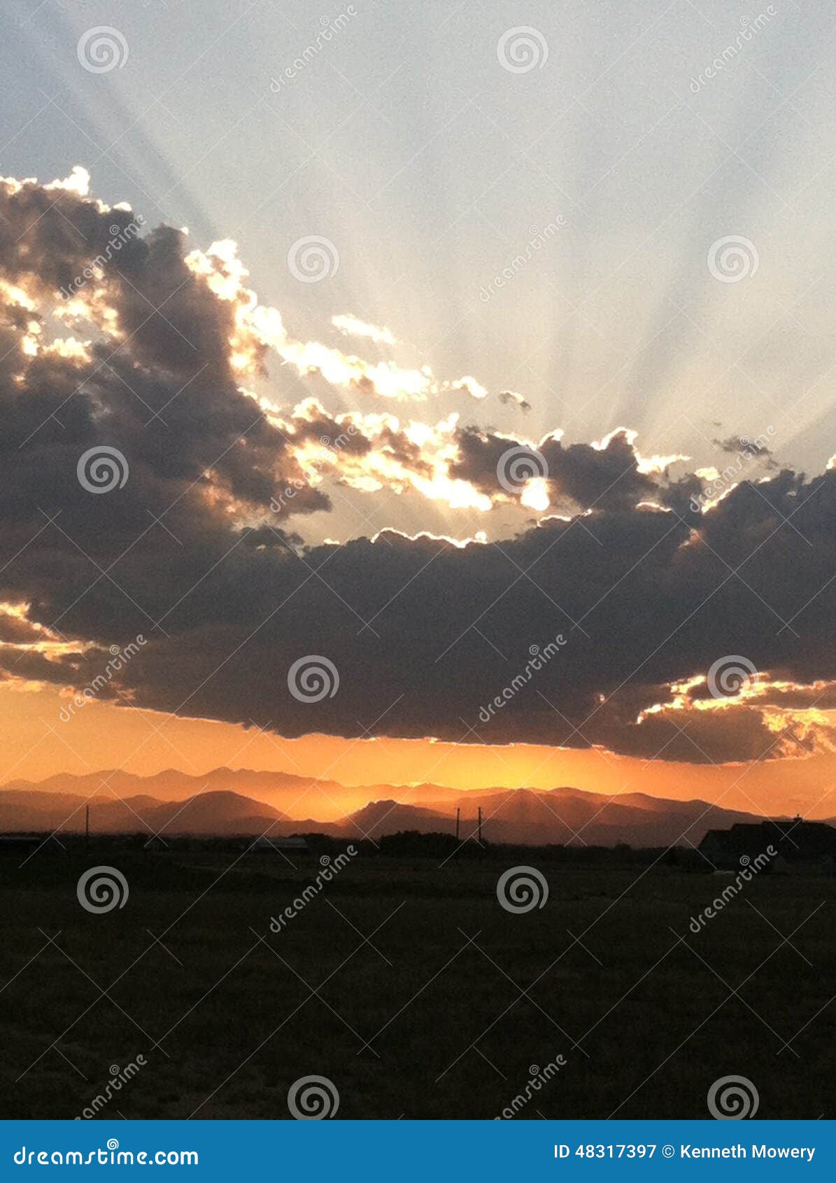 Sunset Behind Clouds Over Mountains 4 Stock Image - Image of sunburst ...