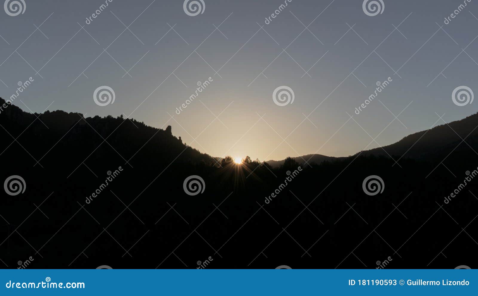 Sunset Behind the Mountains Stock Image - Image of beautiful, landscape ...