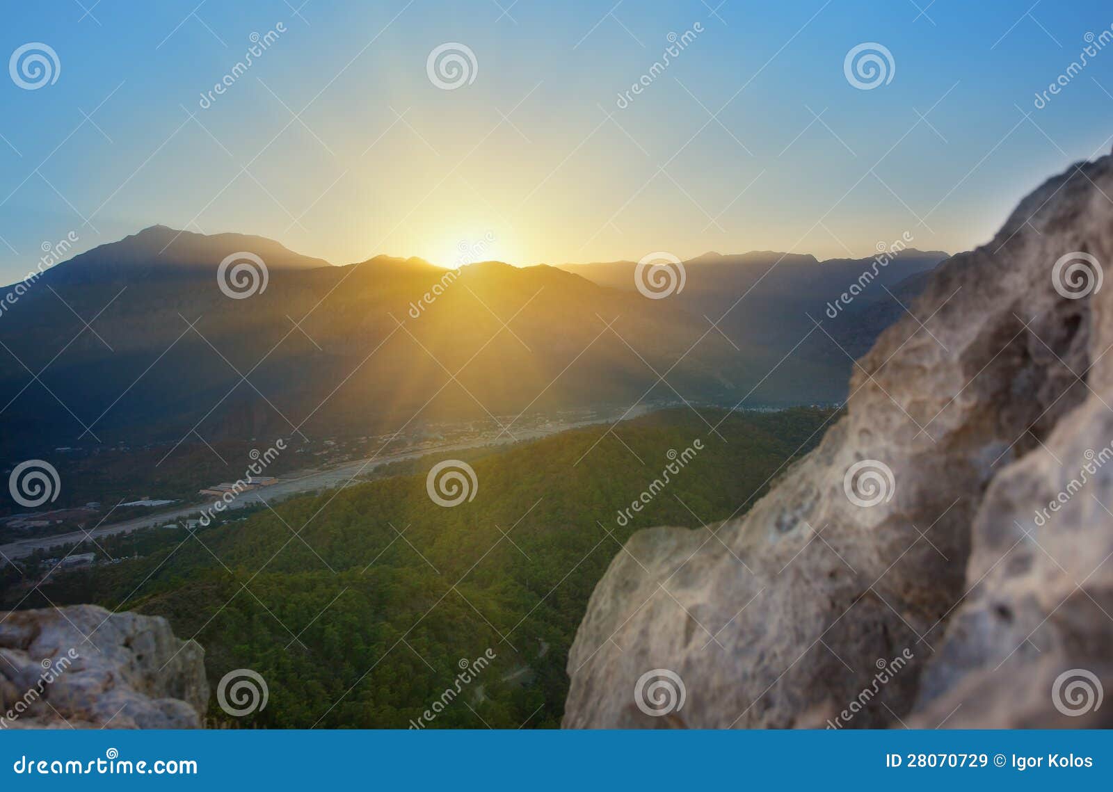 Sunset behind mountains stock image. Image of travel - 28070729