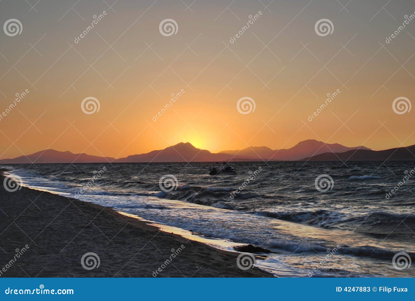 Sunset Behind the Mountains Stock Image - Image of peaceful, beach: 4247883