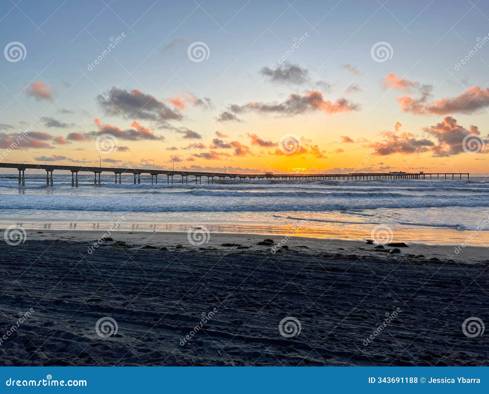 Sunset Behind Ocean Beach Pier with Crashing Waves Stock Photo - Image ...