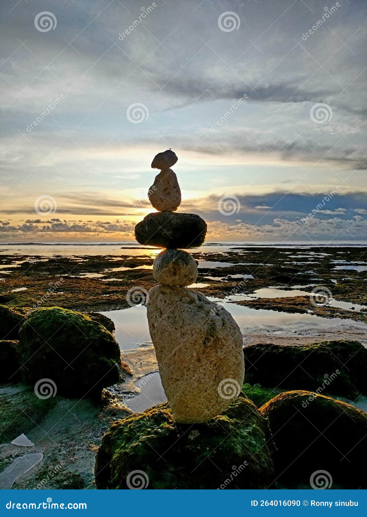 Sunset Behind a Pile of Rocks Stock Photo - Image of sunset, rocks ...