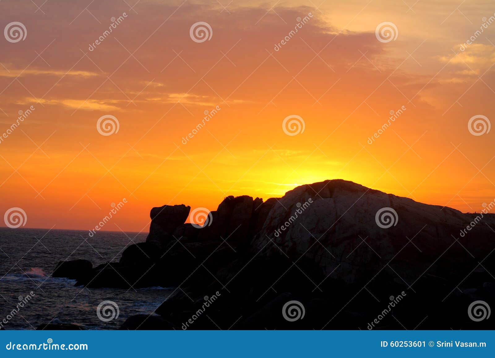 Sunset behind rocks stock image. Image of bright, shadow - 60253601