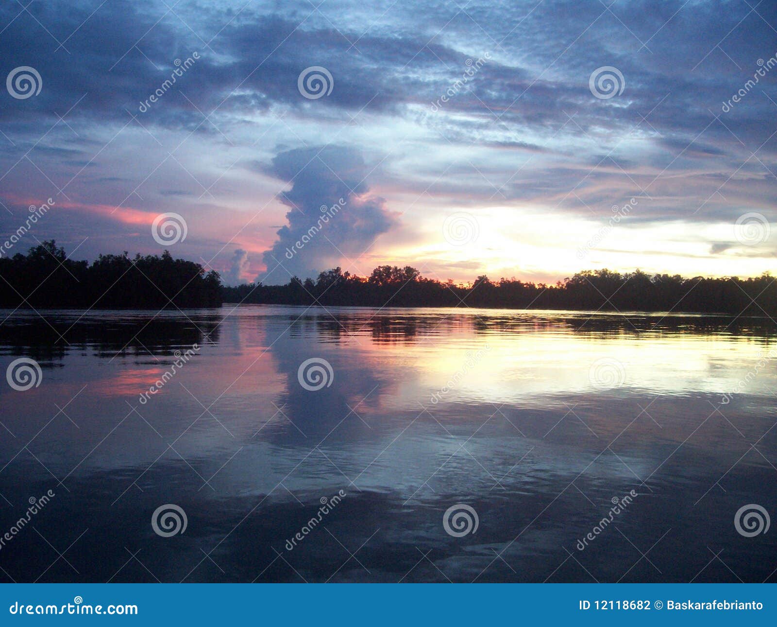 Sunset at Bintuni River stock photo. Image of beautyful - 12118682