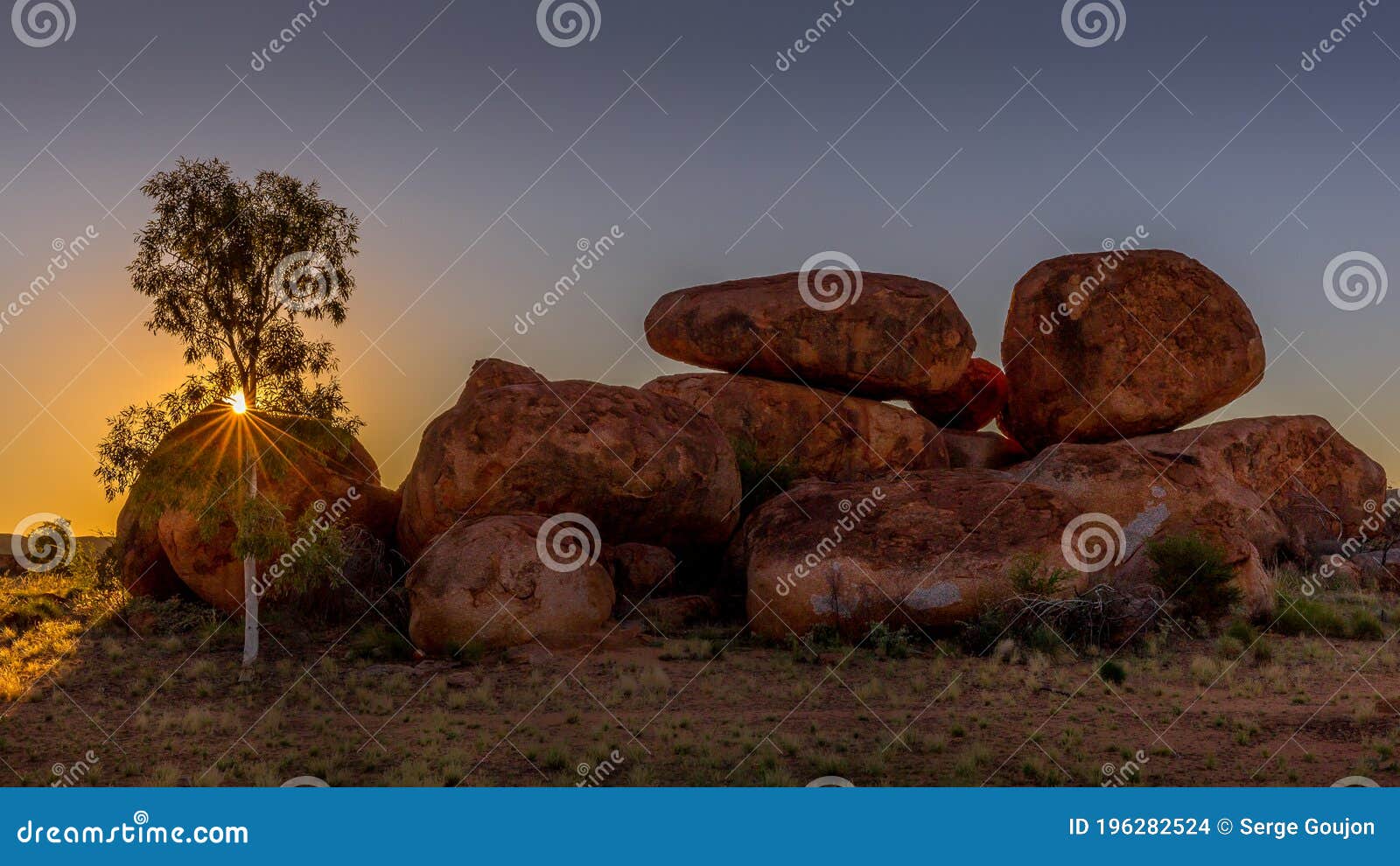 Sunset on Blocks of Stone Rounded by Erosion, Devil`s Marbles Also ...