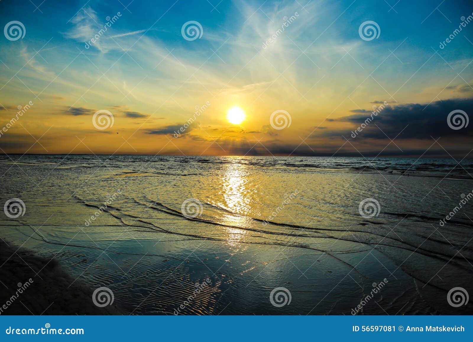 Sunset with blue sea stock image. Image of black, beach - 56597081
