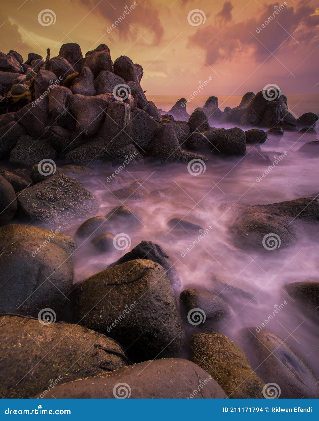 At Sunset the Breakwater Becomes Iconic Stock Photo - Image of terrain ...