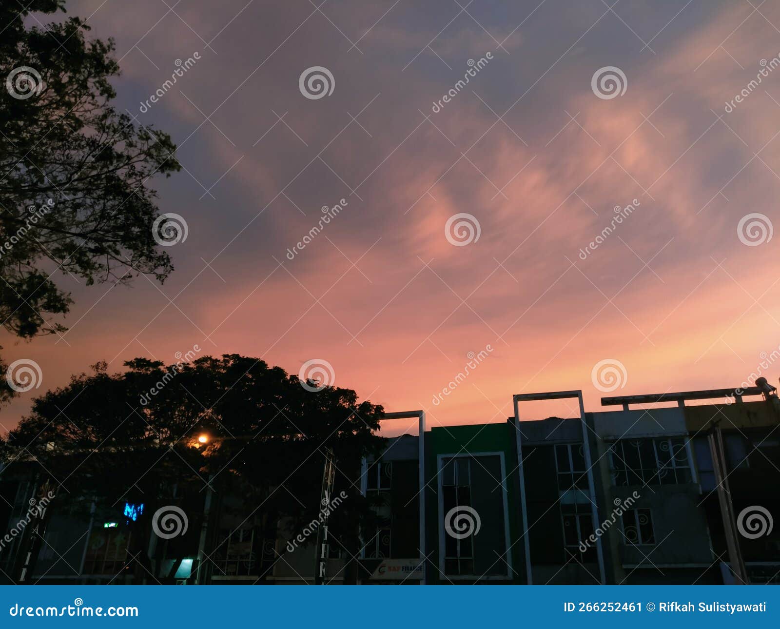 Sunset with the building stock image. Image of firmament - 266252461