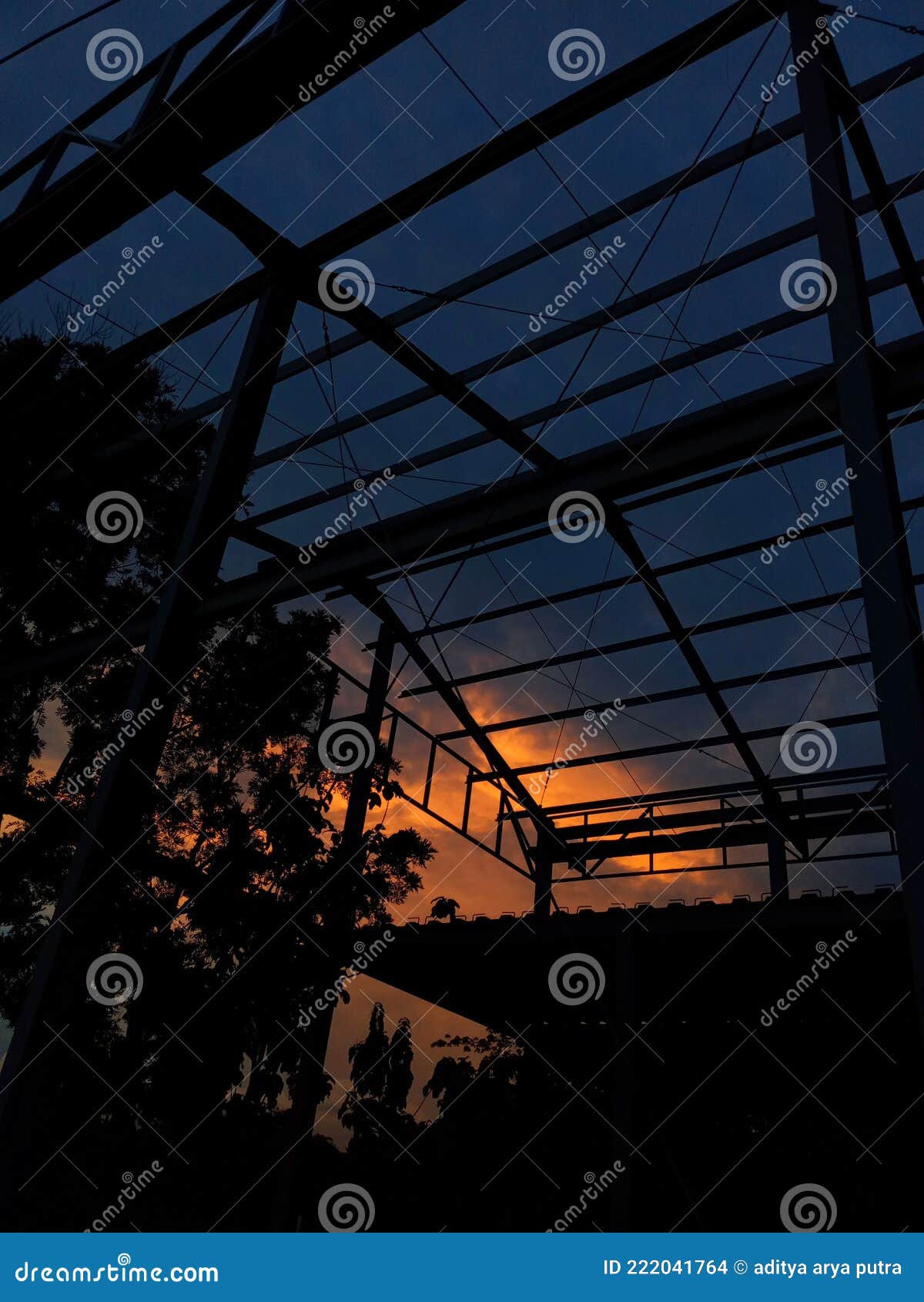 Sunset and building stock photo. Image of yellow, beutiful - 222041764