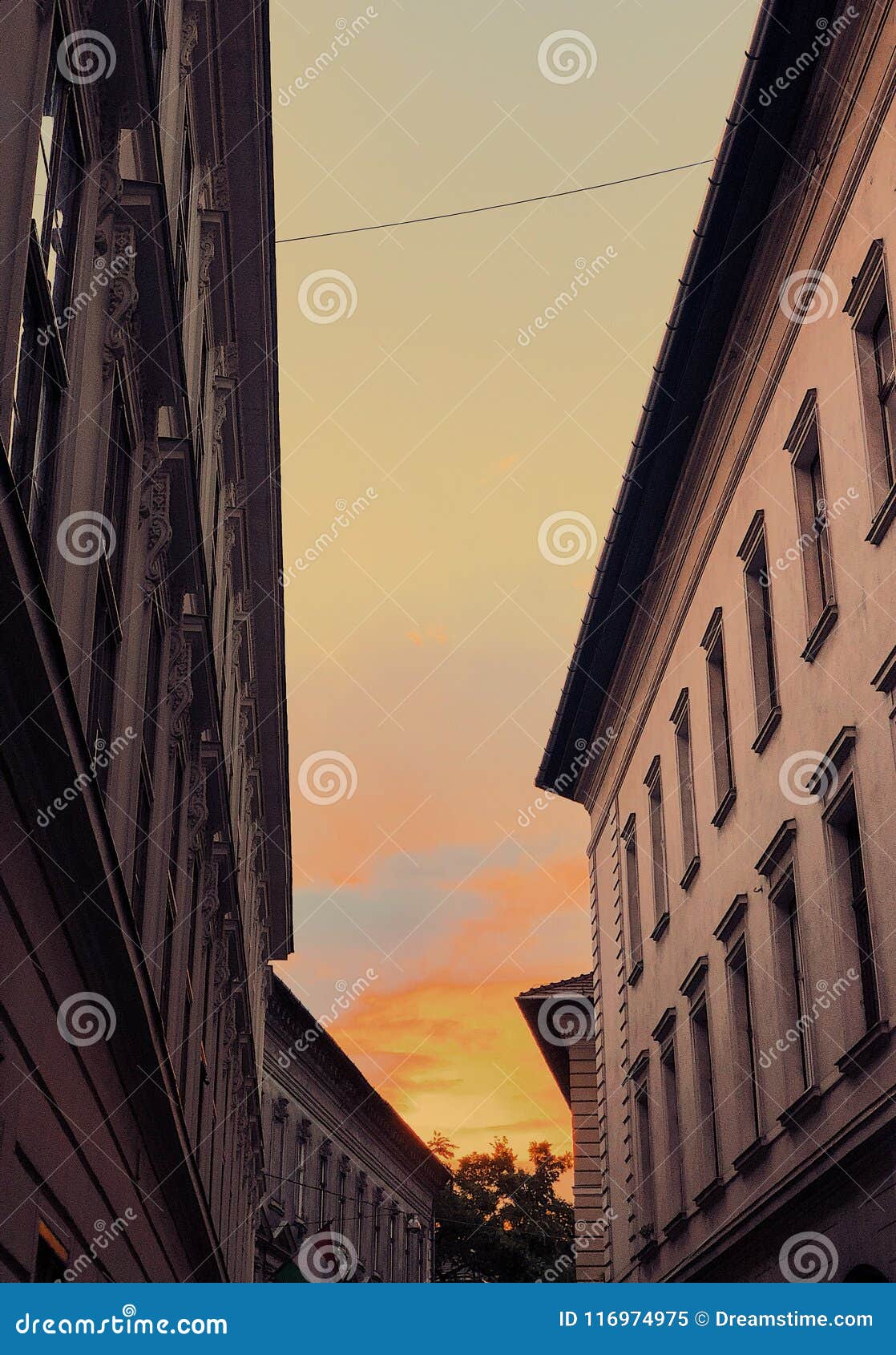 Sunset buildings stock image. Image of orange, city - 116974975