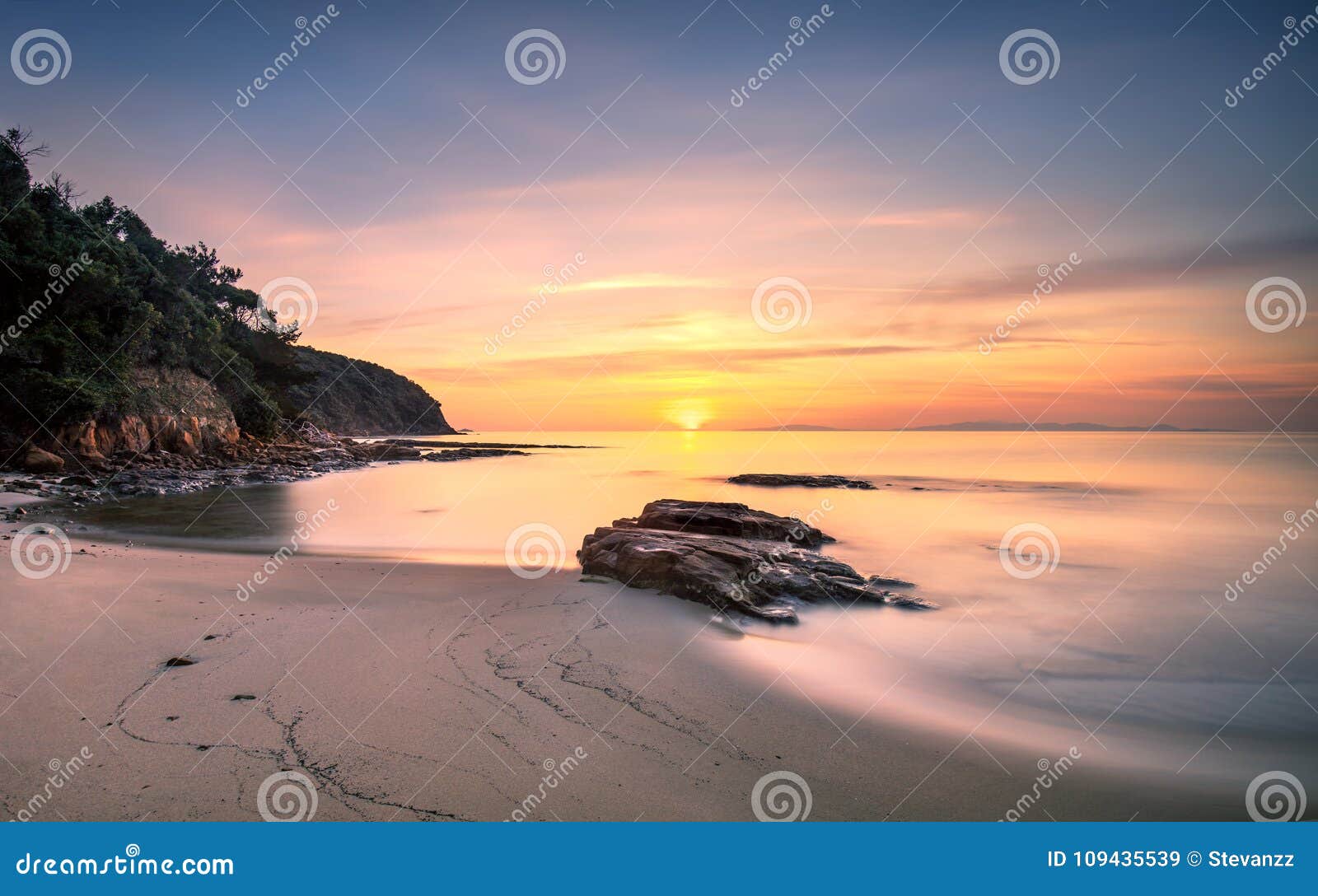 Sunset in Cala Violina Bay Beach in Maremma, Tuscany. Mediterranean Sea ... Sunset in Cala Violina Bay Beach in Maremma, Tuscany. Mediterranean Sea ...