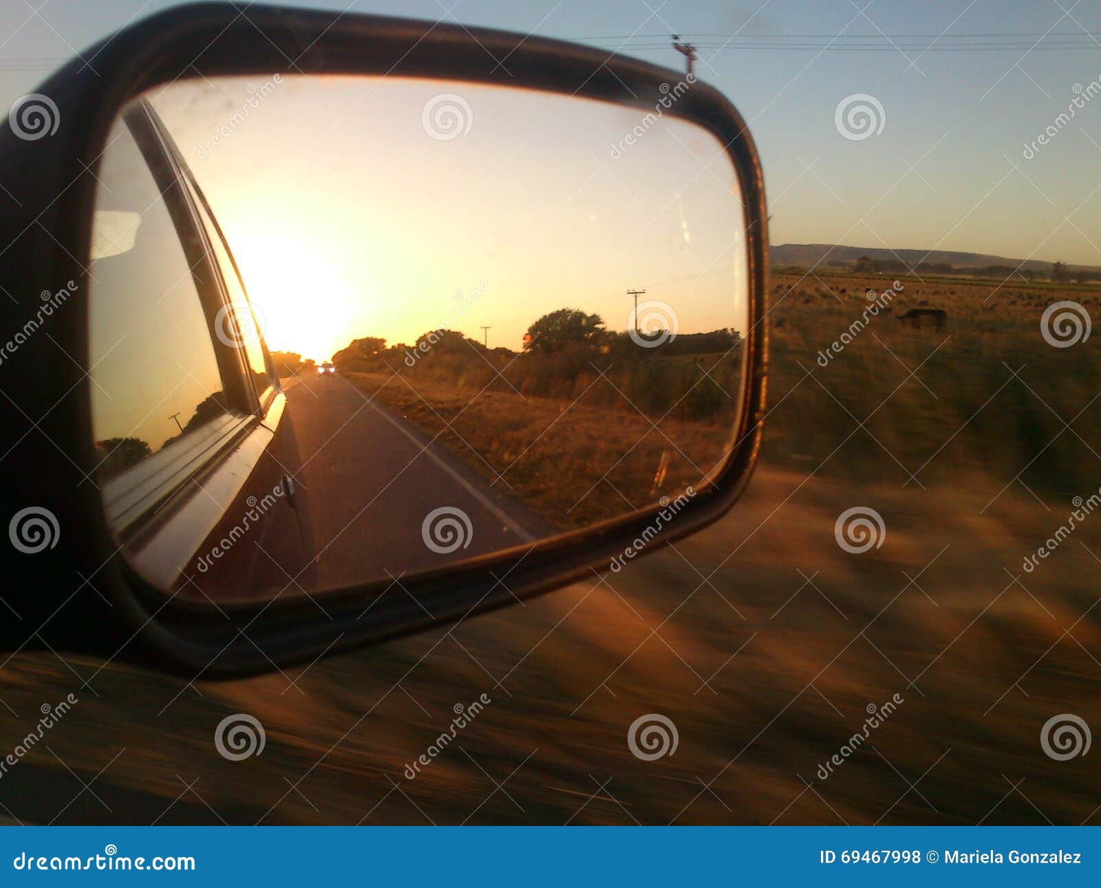 Sunset on car mirror stock photo. Image of biutifull - 69467998