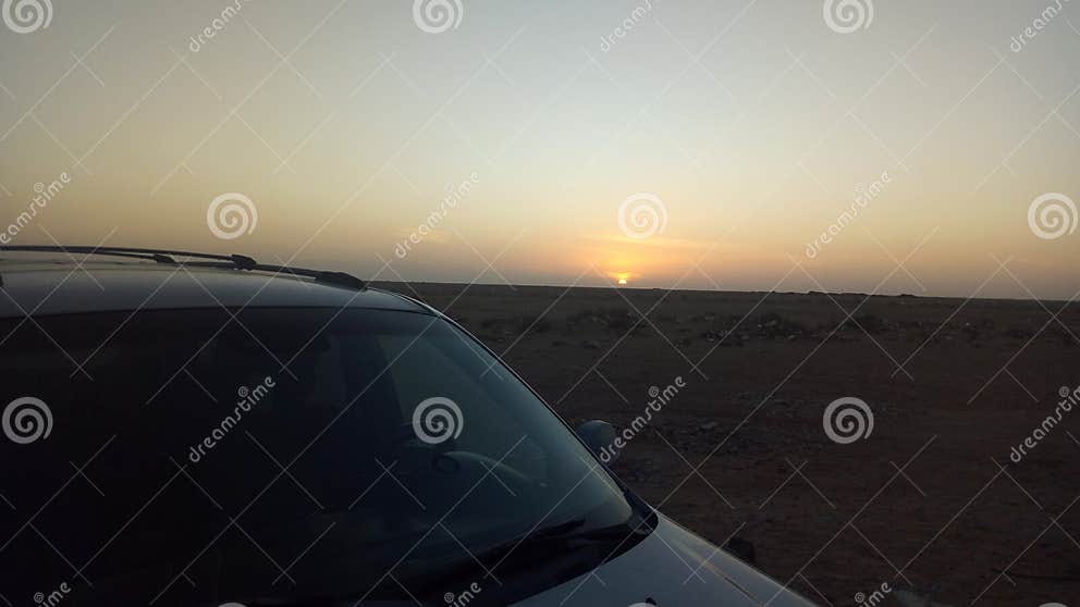 Sunset through a Car Windshield in the Desert at the Beginning of ...