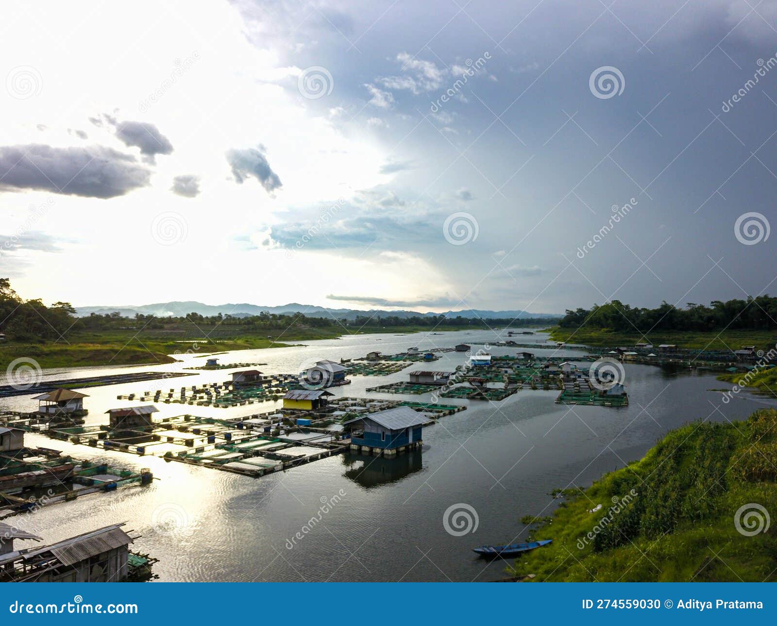 Sunset at Citarum river stock photo. Image of river - 274559030