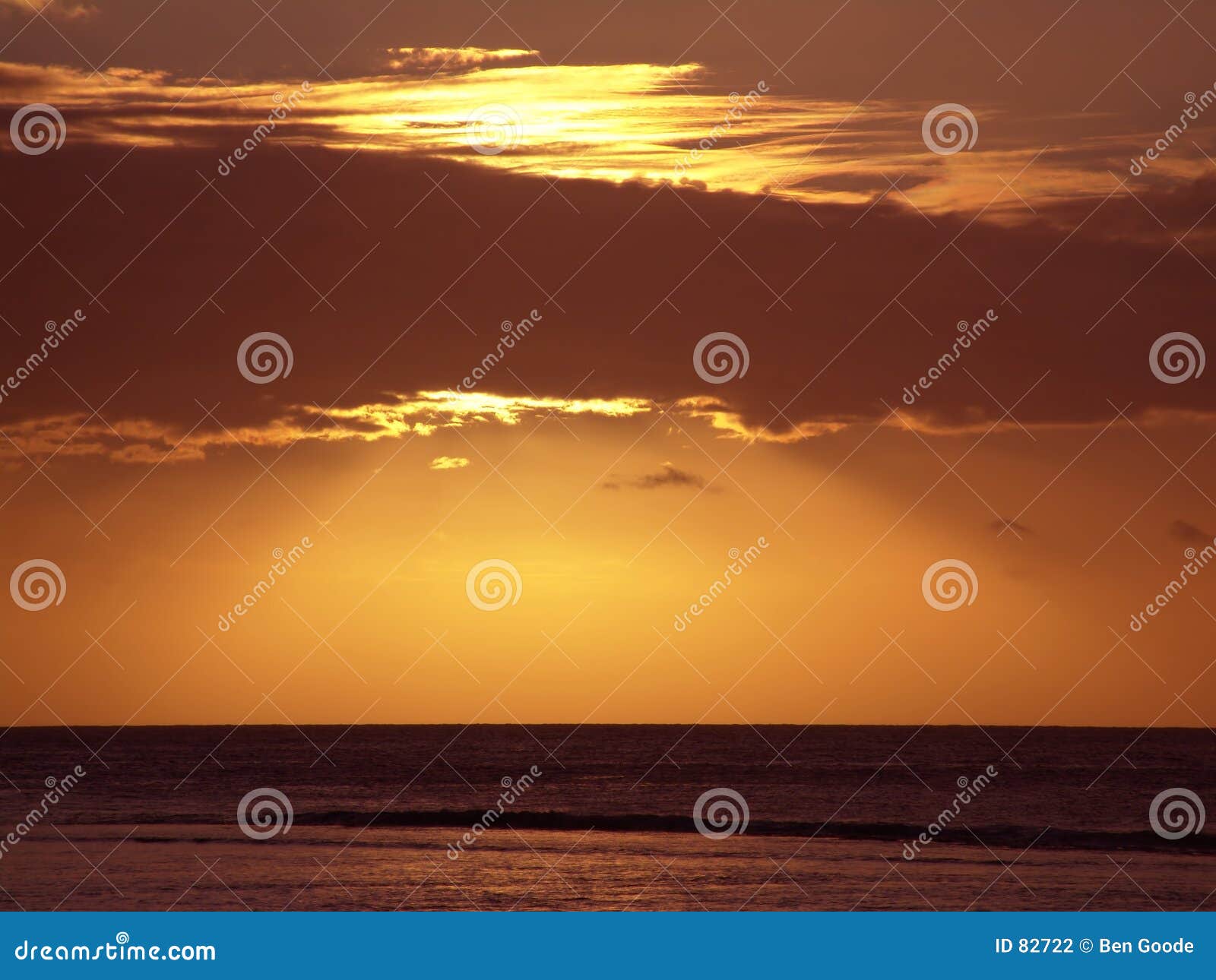 Sunset through clouds stock photo. Image of water, holidays - 82722