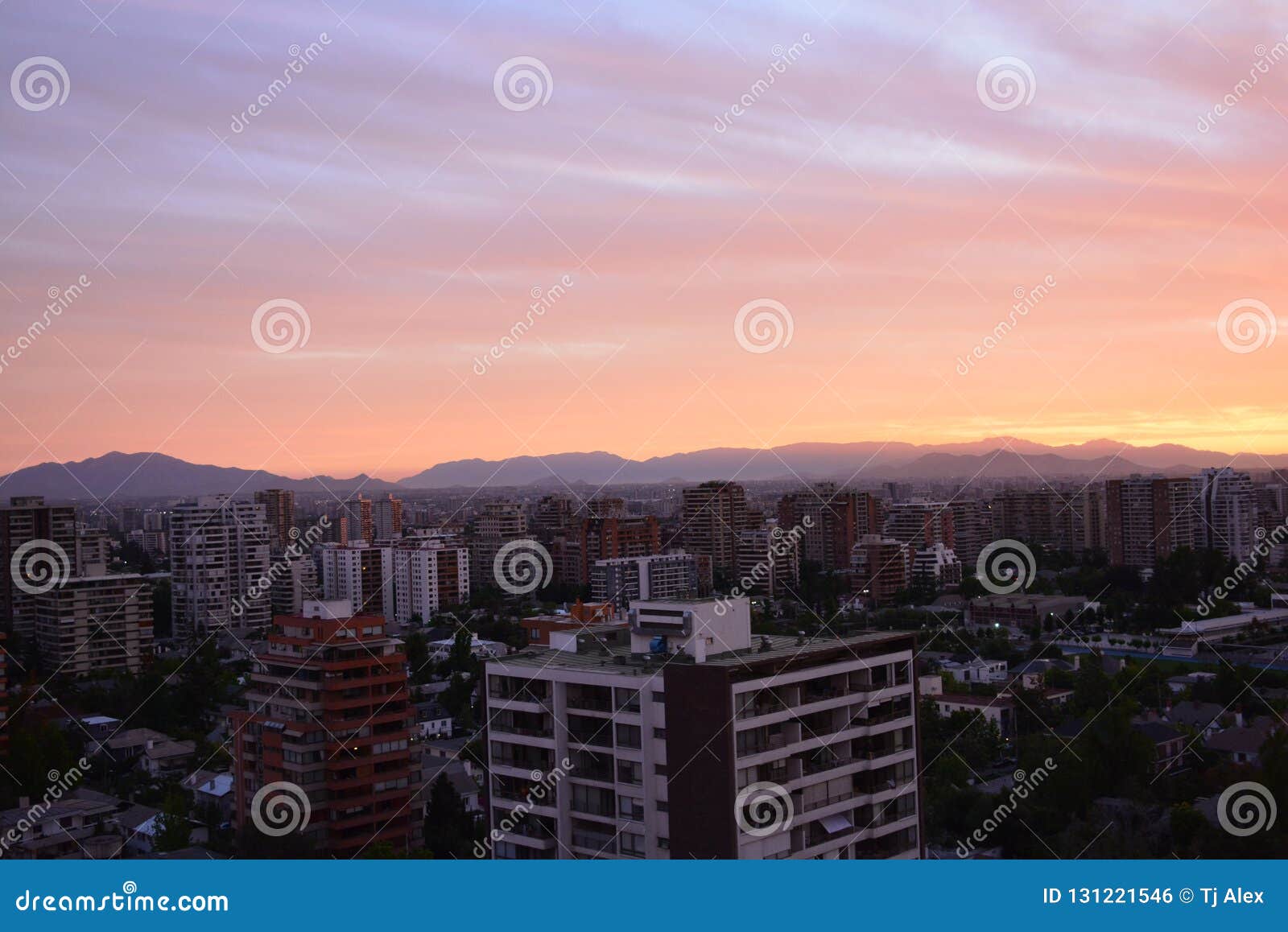 Sunset Clouds and Cityscape Stock Photo - Image of clouds, light: 131221546