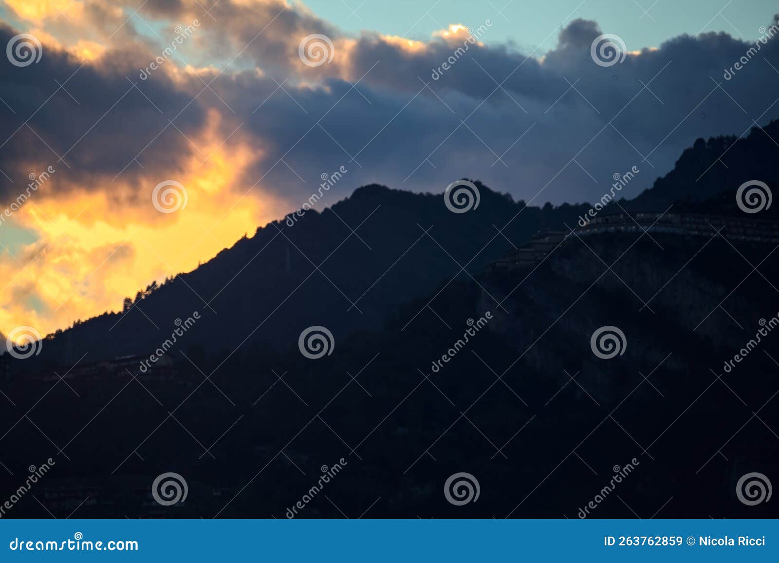 Sunset with Clouds on a Mountain Ridge Stock Image - Image of ...