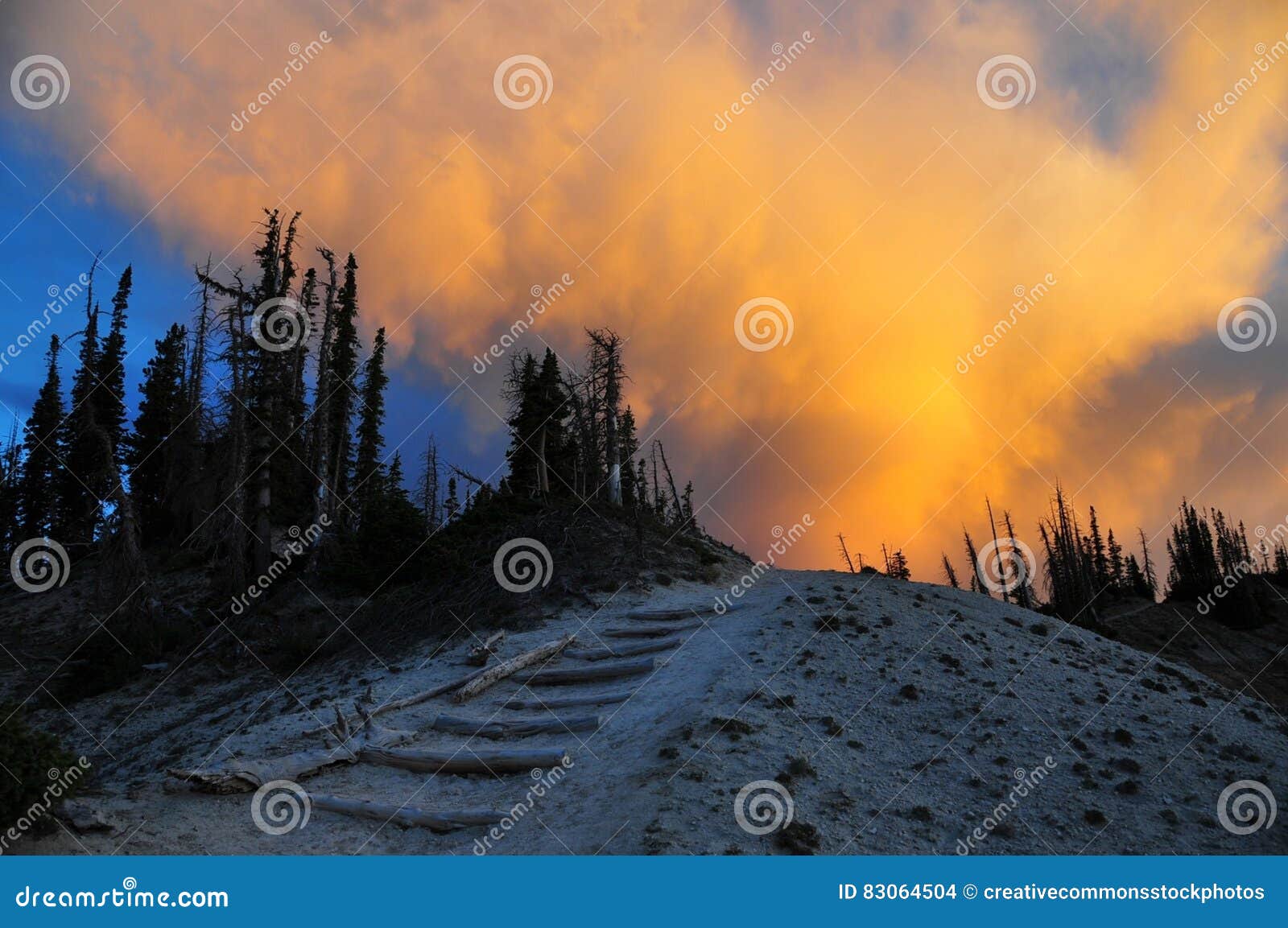 Sunset In Clouds Over Hillside Picture. Image: 83064504