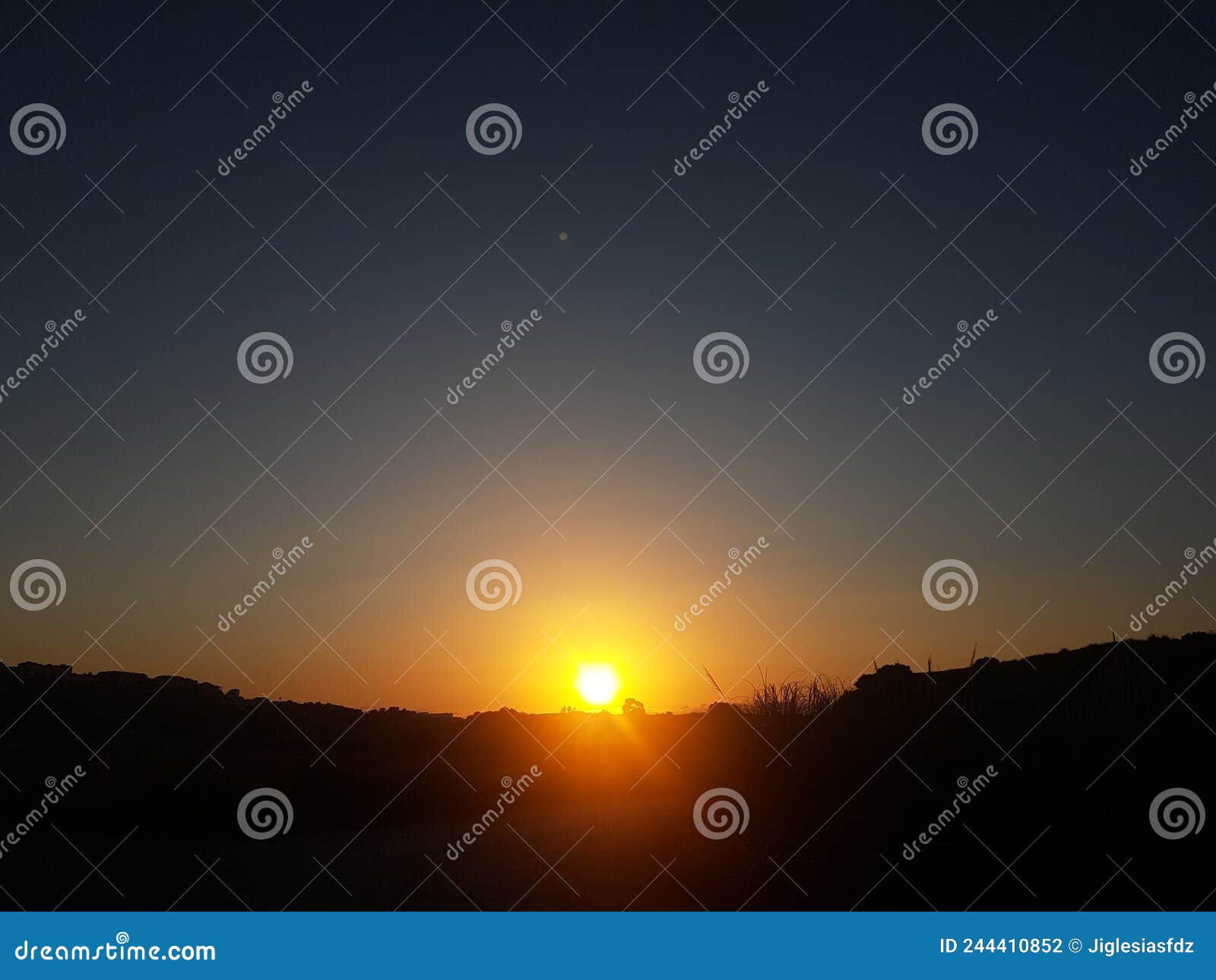 Sunset without clouds stock photo. Image of nature, light - 244410852
