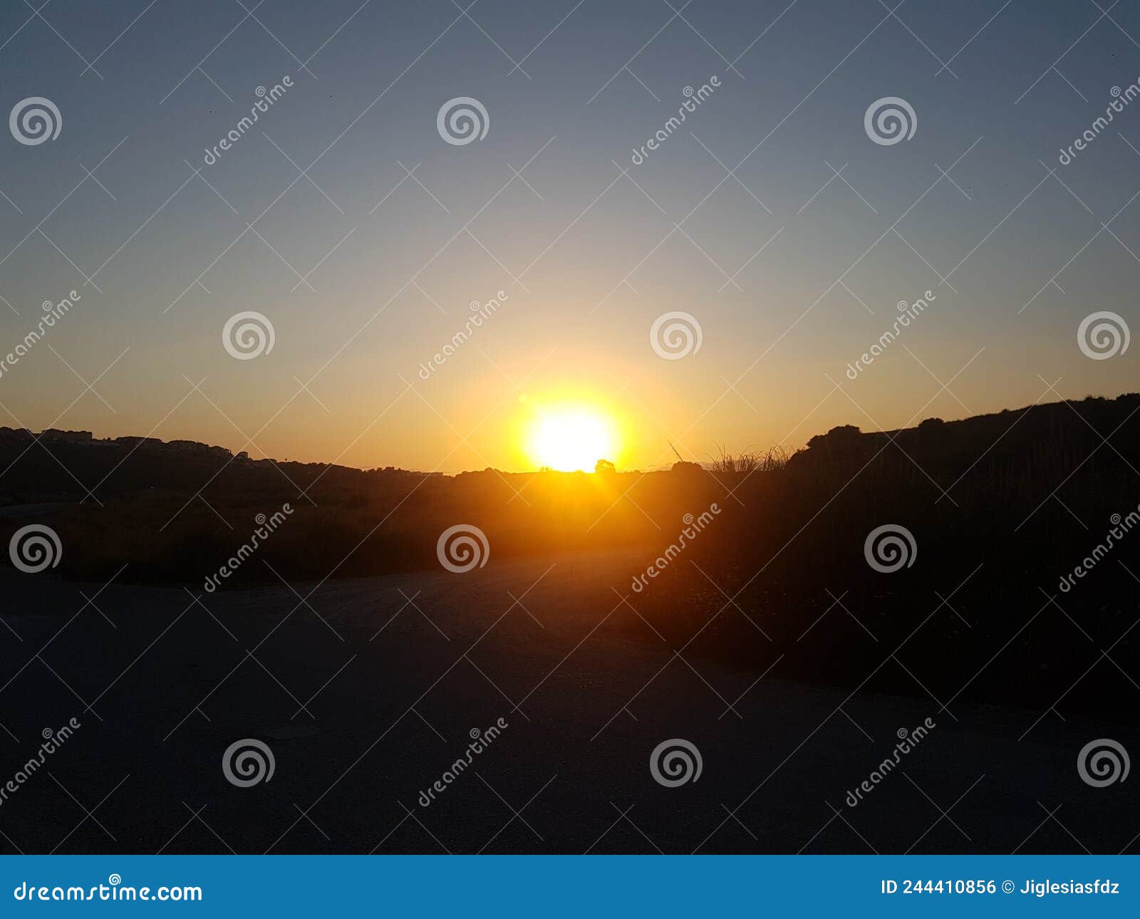 Sunset without clouds stock photo. Image of space, road - 244410856