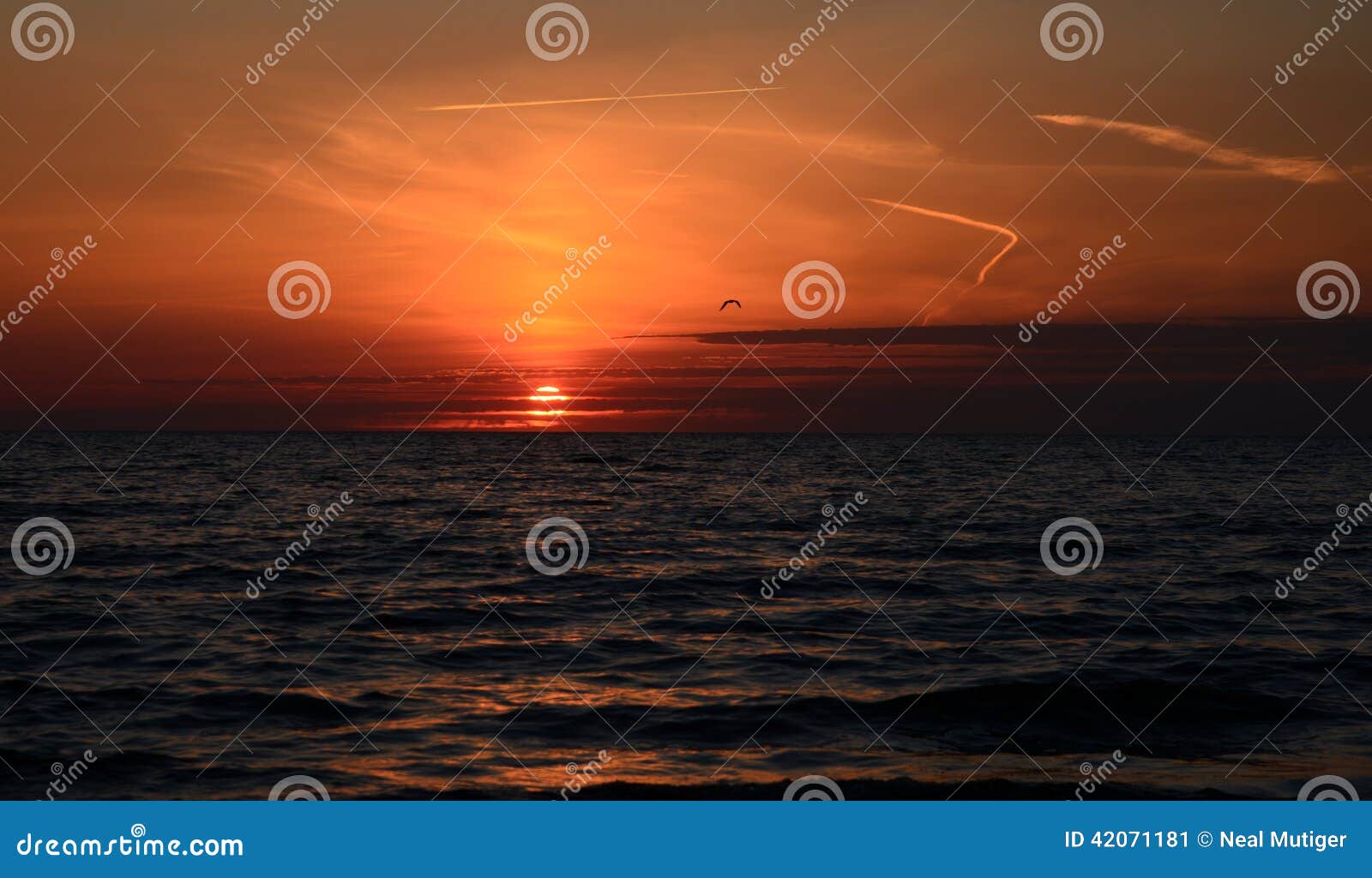 Sunset through the clouds stock image. Image of waves - 42071181
