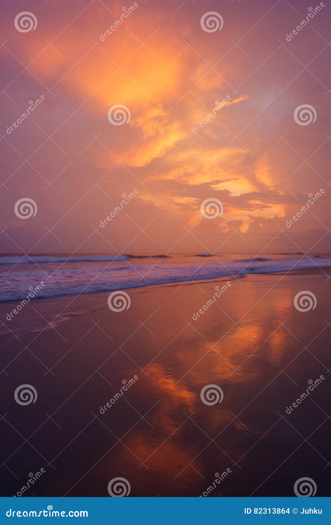 Sunset Clouds and Waves on Empty Beach Stock Photo - Image of sandy ...