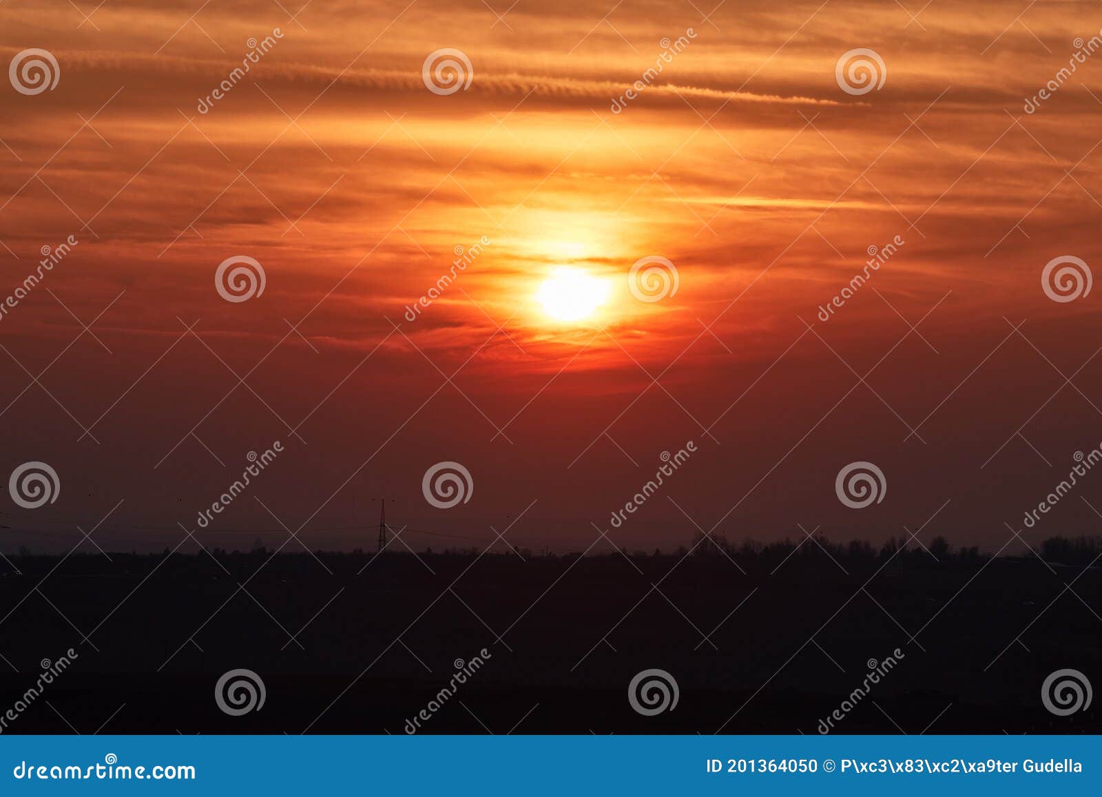 Sunset through Cloudy Red Sky Stock Photo - Image of shadow, atmosphere ...