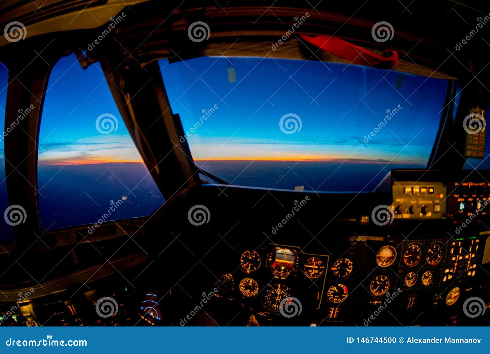 Sunset from the cockpit. stock photo. Image of clouds - 146744500