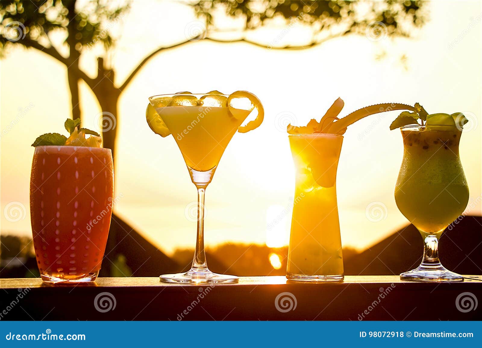 Sunset cocktails stock photo. Image of mocktail, chilled - 98072918