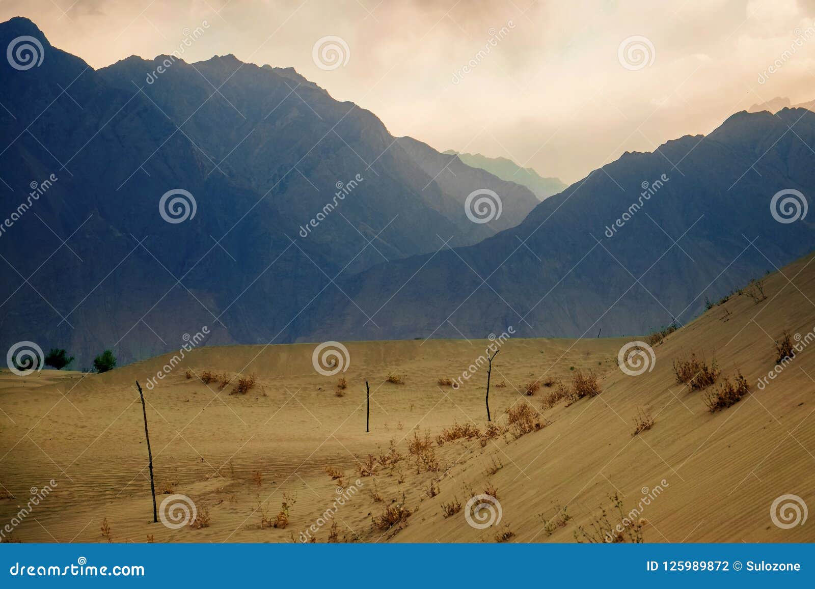 Sunset at Cold Desert with Beutiful Layer of Mountains Stock Photo ...