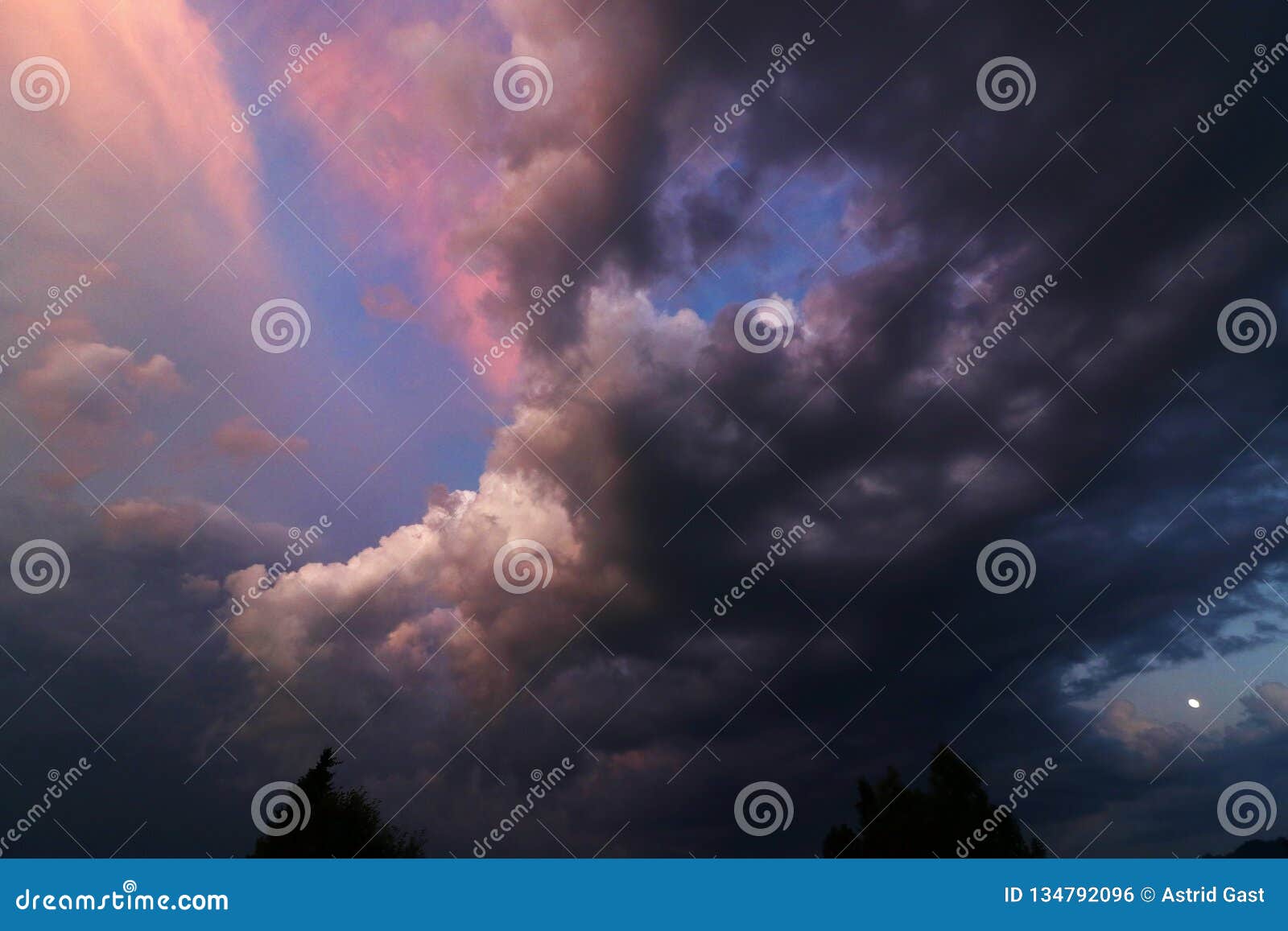 Sundown with thunderclouds stock photo. Image of clouds - 134792096