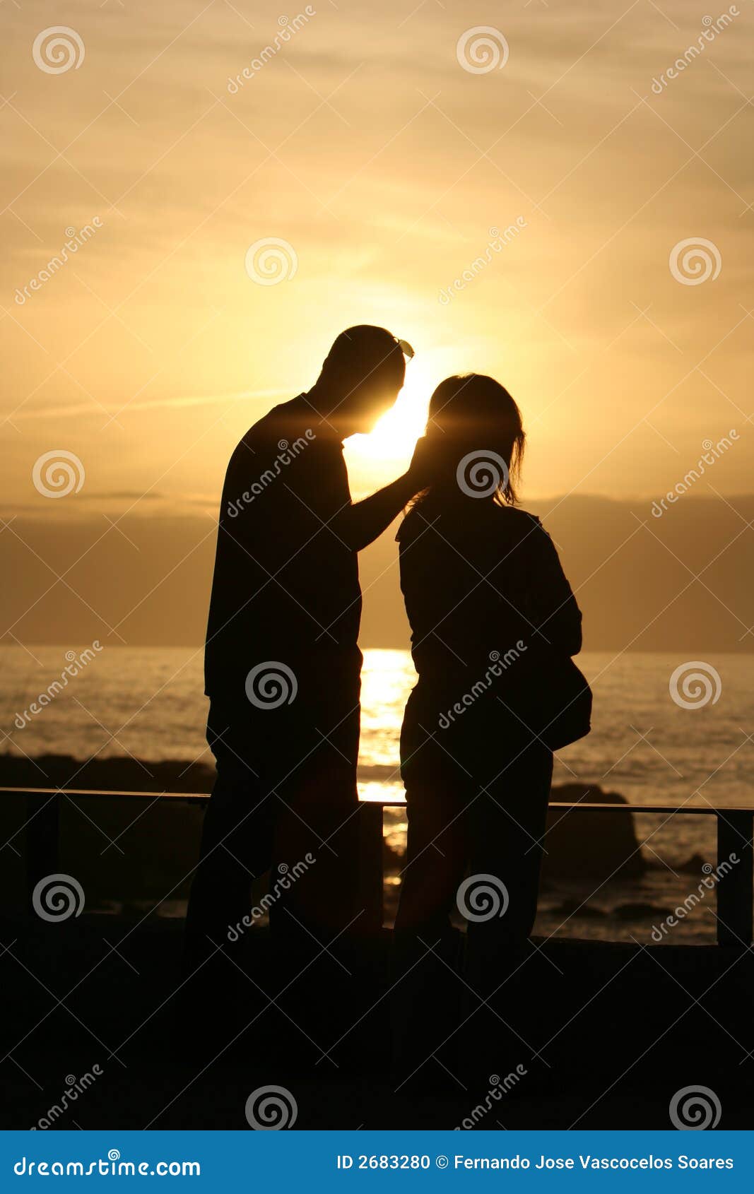 Sunset couple stock photo. Image of introspective, dark - 2683280