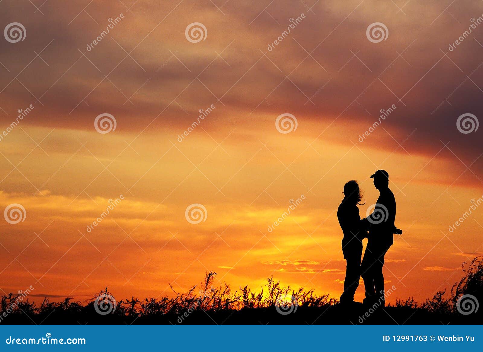 Sunset couples stock image. Image of kissing, beach, couple - 12991763