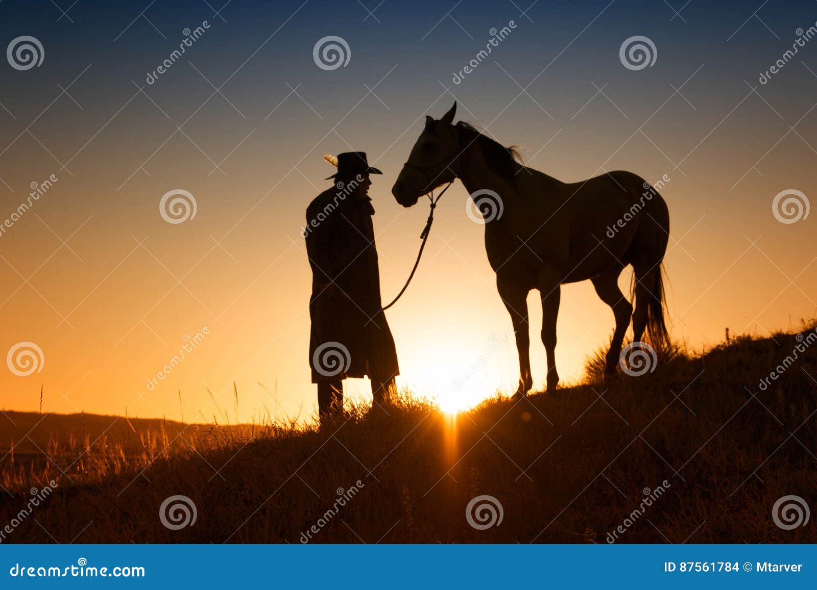 Sunset Cowboy stock photo. Image of silhouette, tranquil - 87561784
