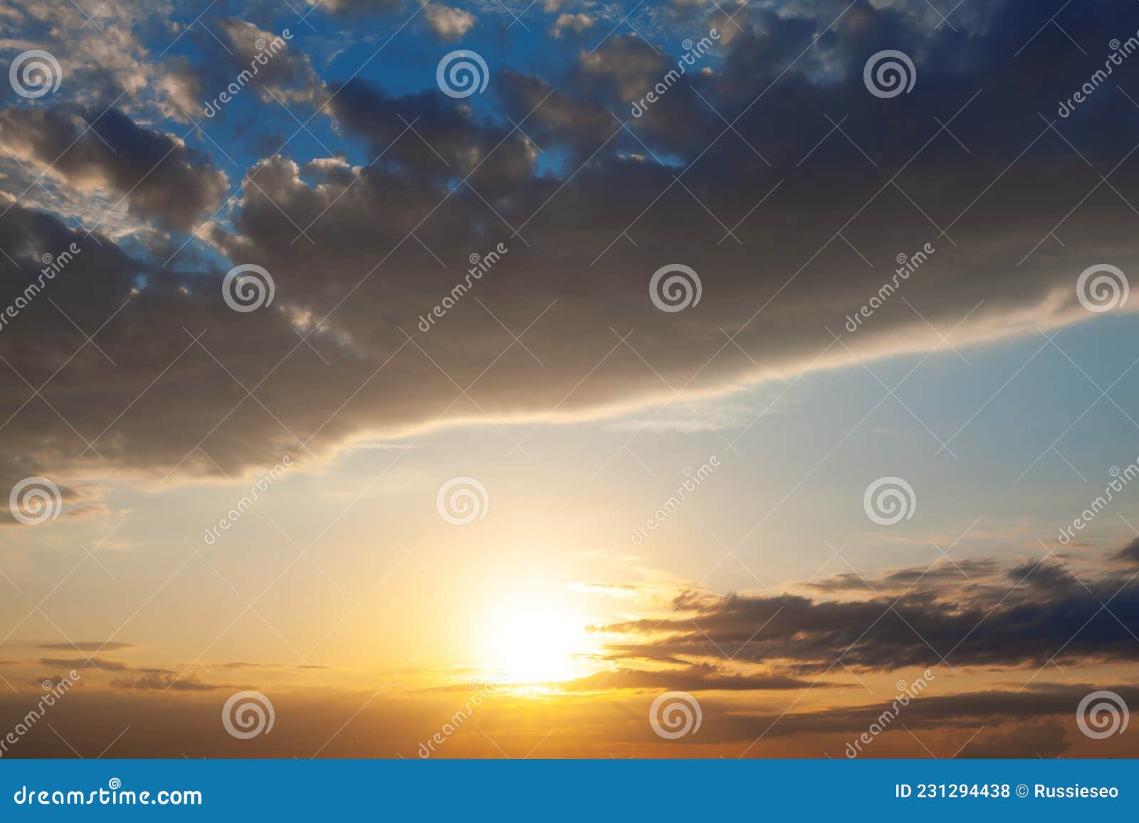 Sunset with dark clouds stock photo. Image of romantic - 231294438