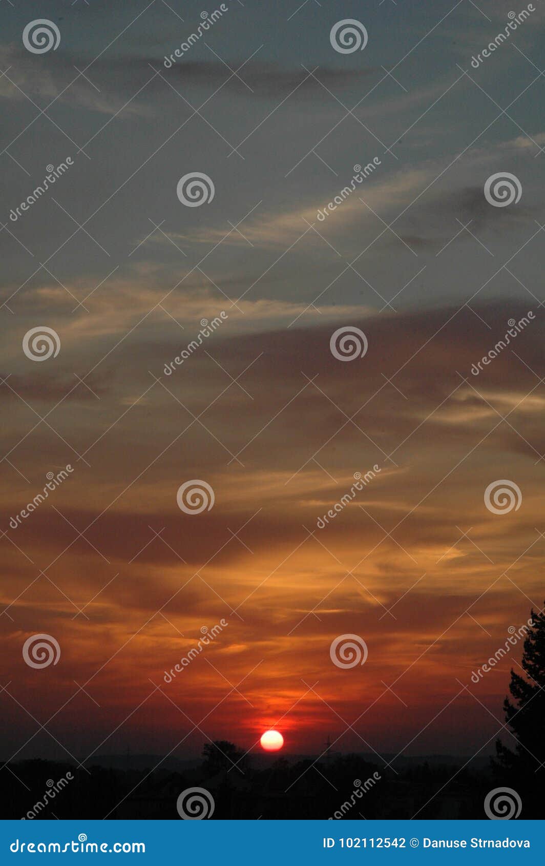 Sunset over the town stock photo. Image of sunset, dawn - 102112542