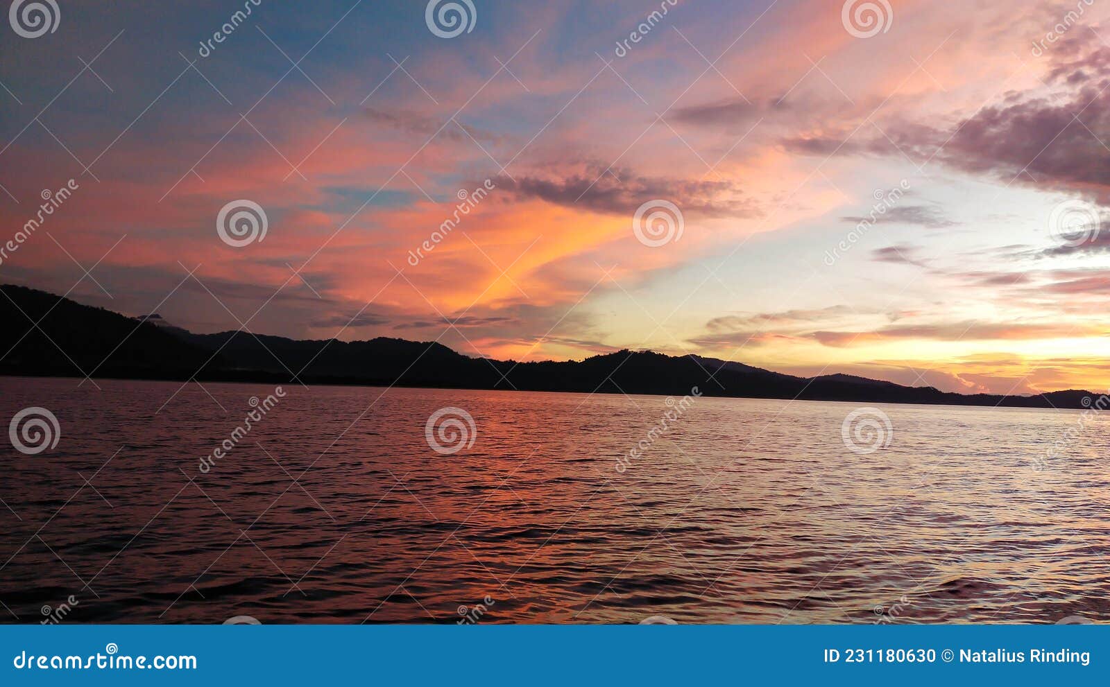 Sunset at Sea / Sunset Di Laut Stock Photo - Image of cloud, wave ...