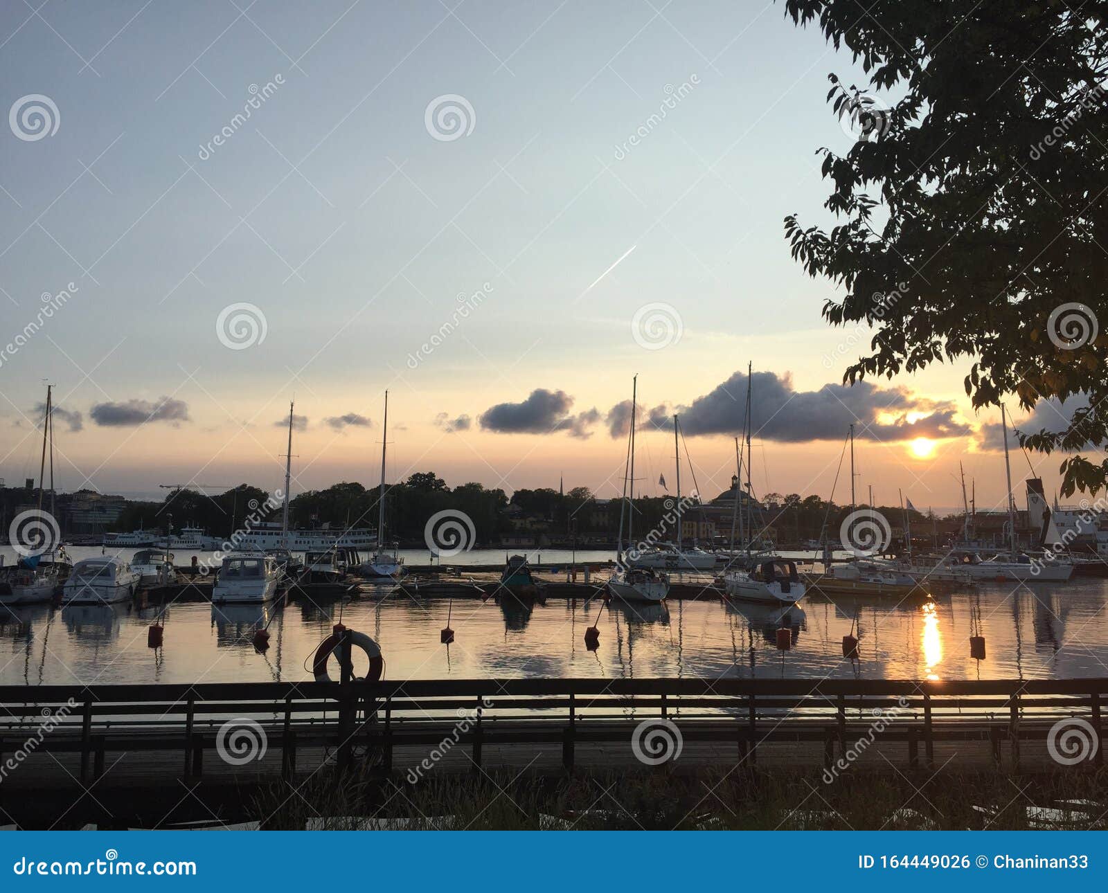 Sunset at the dock stock photo. Image of relaxation - 164449026
