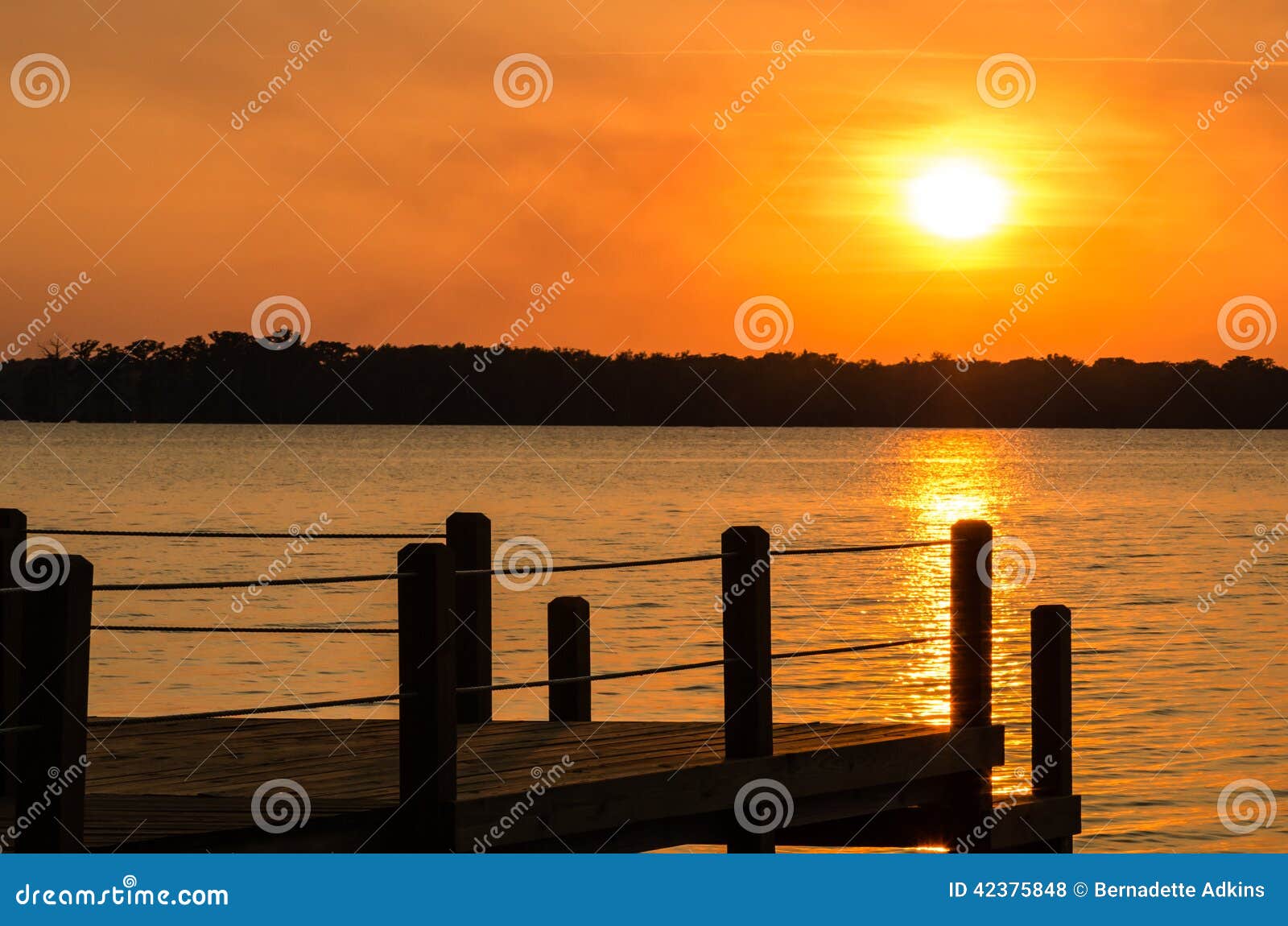 Sunset and dock stock photo. Image of silhouette, silouhette - 42375848