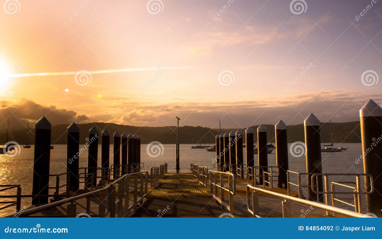 Sunset at docks stock photo. Image of sunset, sunrays - 84854092