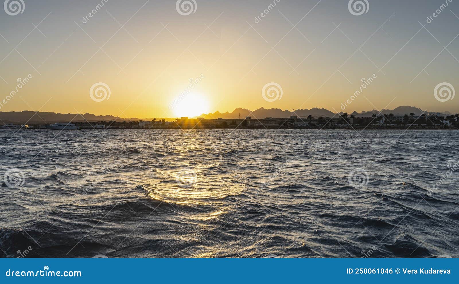 Sunset in Egypt. the Rays of the Setting Sun Illuminate the Mountain ...